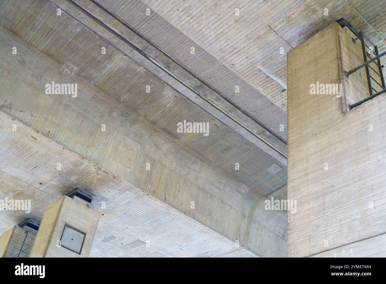 Close-up of concrete structure of highway bridge. Concept of giant ...