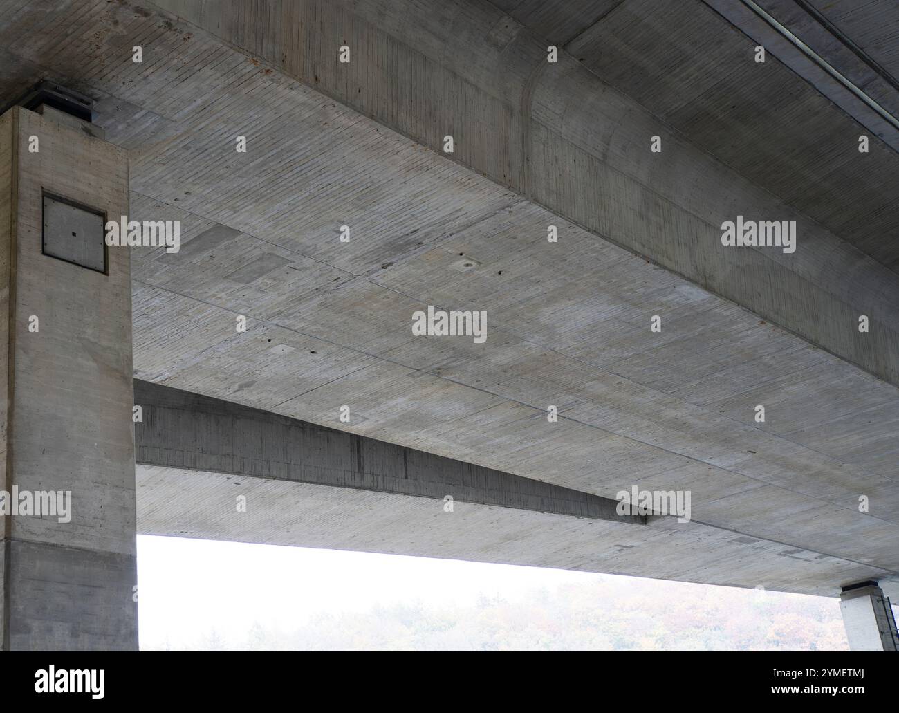 Close-up of concrete structure of highway bridge. Concept of giant ...