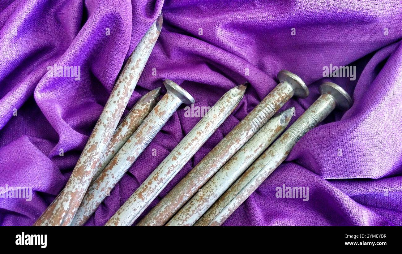 Good Friday Jesus Crucifixion Nails and Purple Satin Background Stock ...