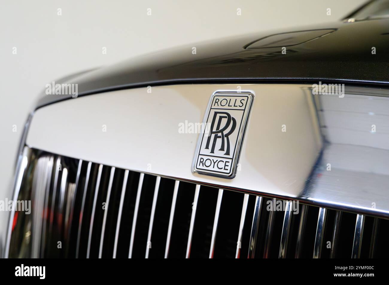 Derby, UK - 17 Nov 2024: Rolls Royce Iconic RR Badge on a black wraith ...