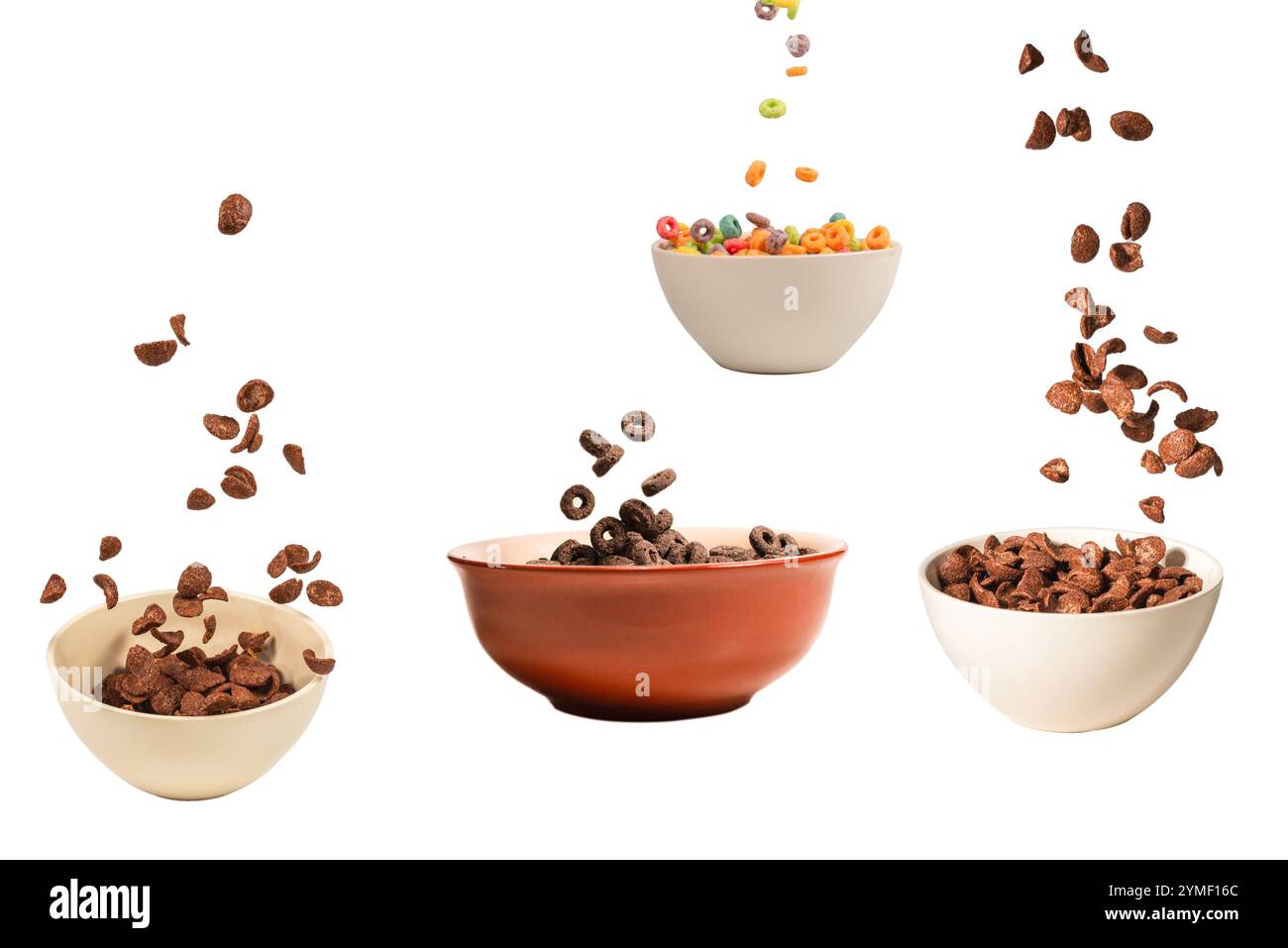 Chocolate corn flakes falling to the white bowl isolated on white ...