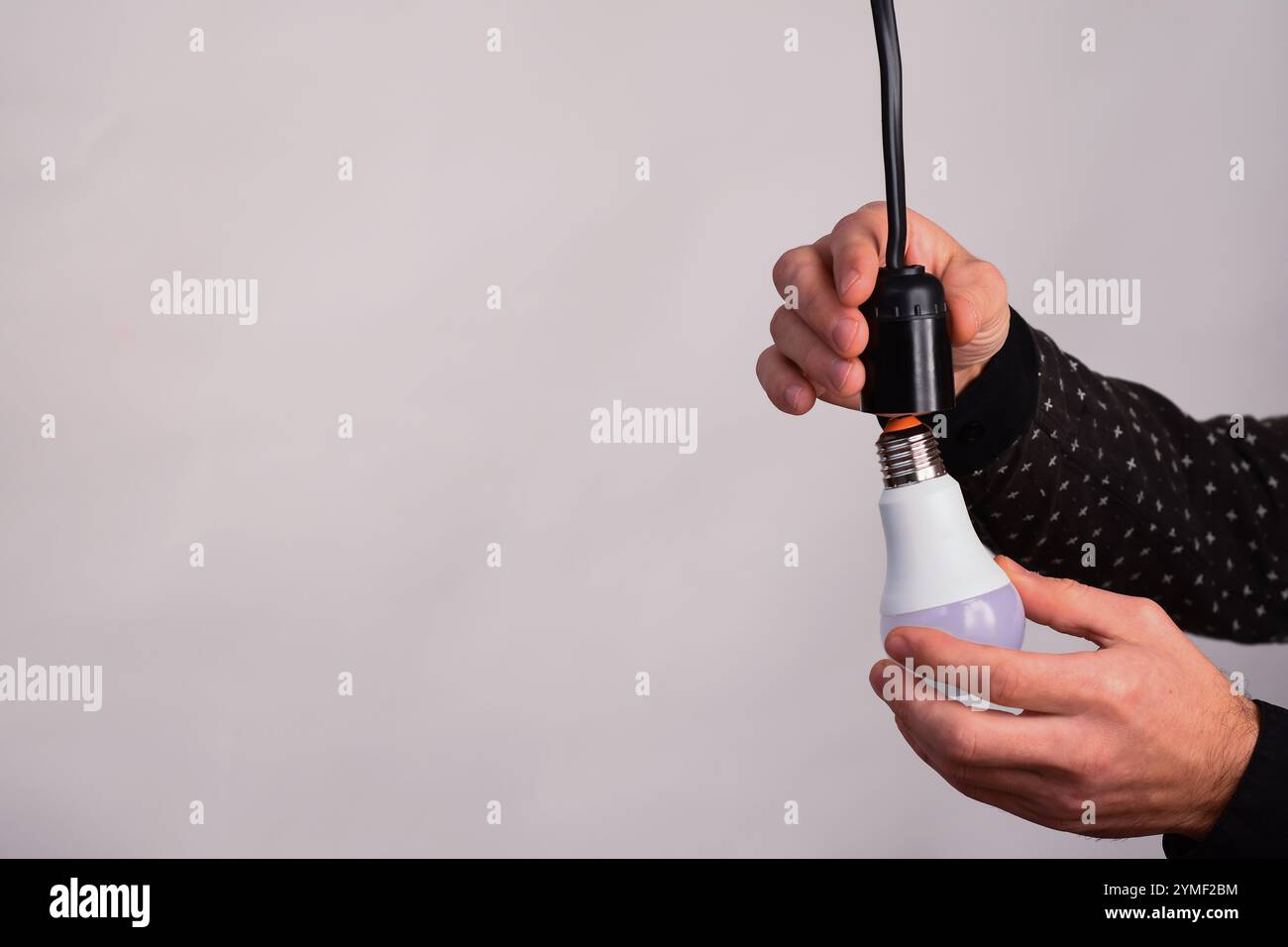 Man installing lamp on hi-res stock photography and images - Alamy