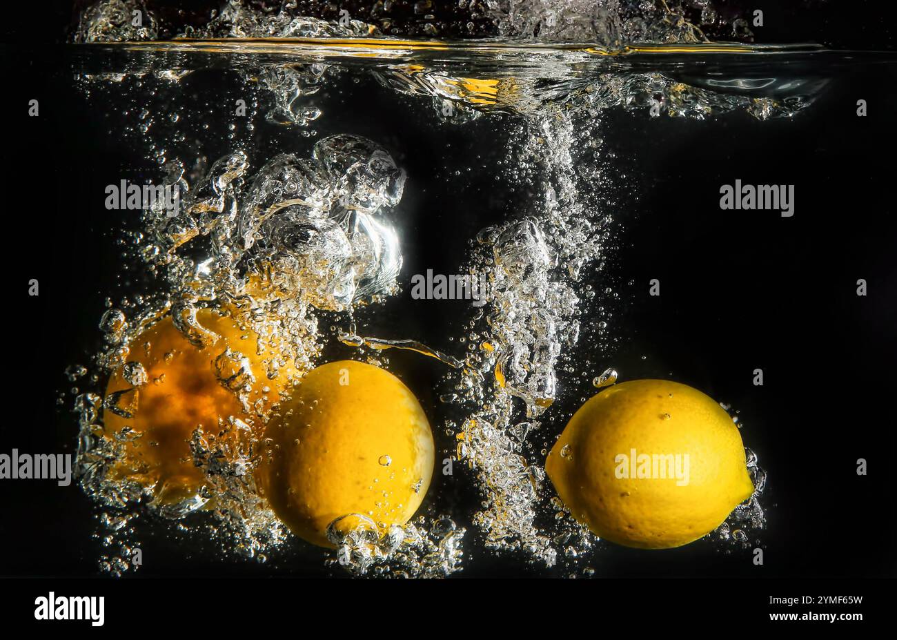 Yellow water splash hi-res stock photography and images - Alamy