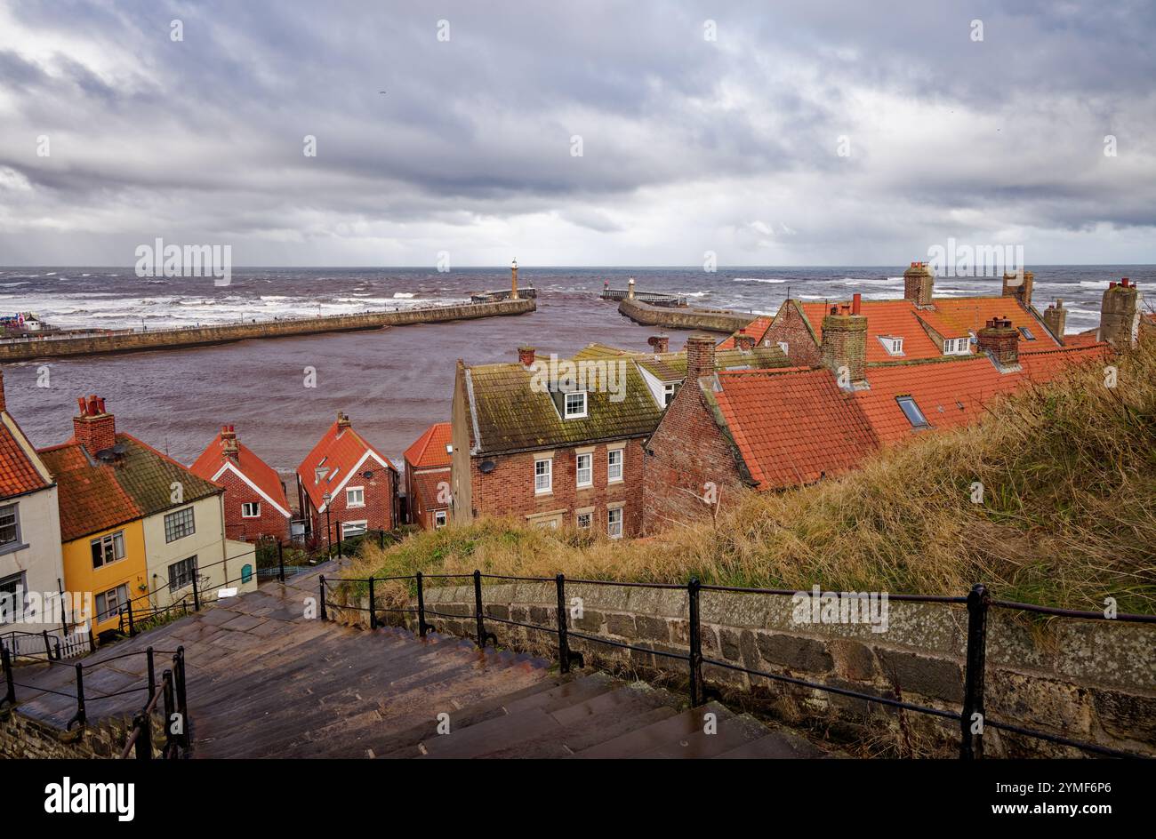 View of rough seas beyond Whitby Harbour, England Stock Photo - Alamy