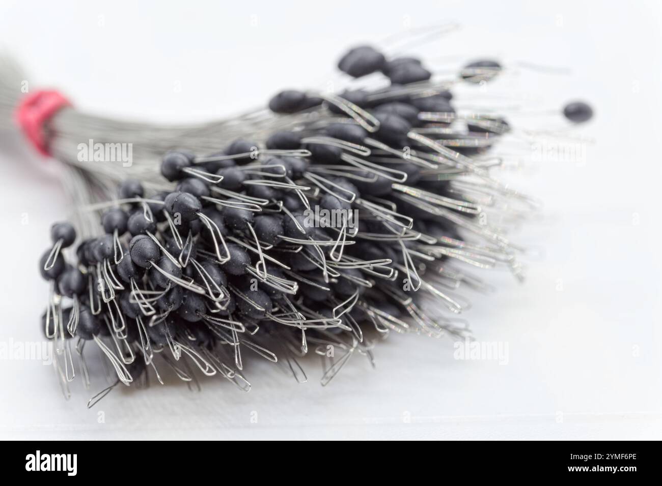 Fishing accessories, many line stops used in multiple roles depending ...