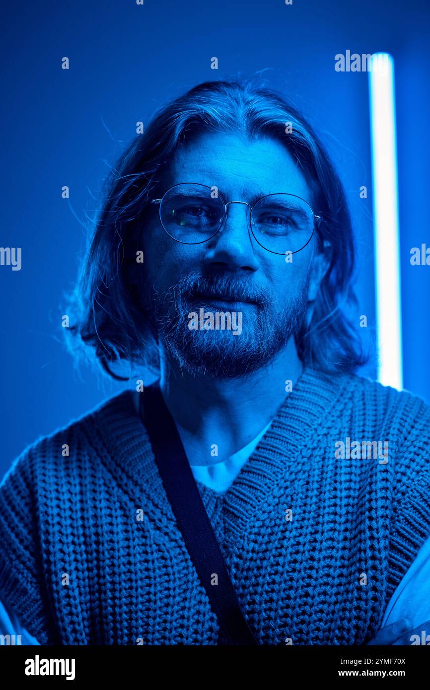 Person wearing blue sweater hi-res stock photography and images - Alamy