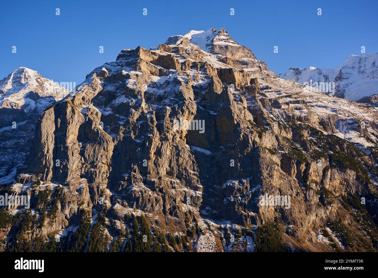 Landscape with the Swiss alps in a cold sunny November day, powdered ...
