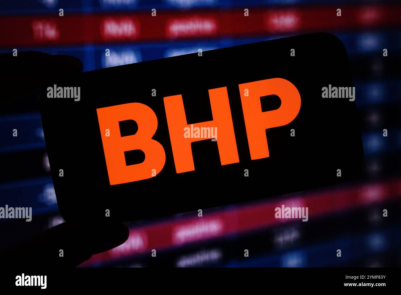 In this photo illustration, the BHP Group company logo is seen ...