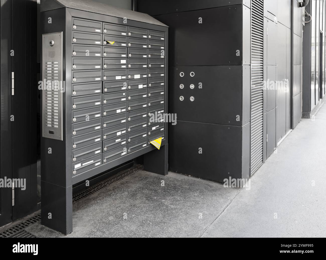 Black mailboxes in residential building Stock Photo - Alamy