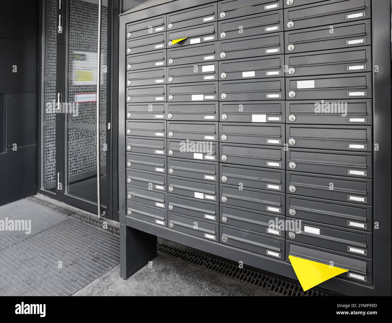 Black mailboxes in residential building Stock Photo - Alamy
