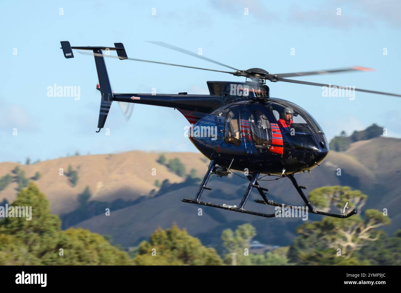 Fiordland Helicopters Hughes 369E helicopter flying in Wairarapa, New ...