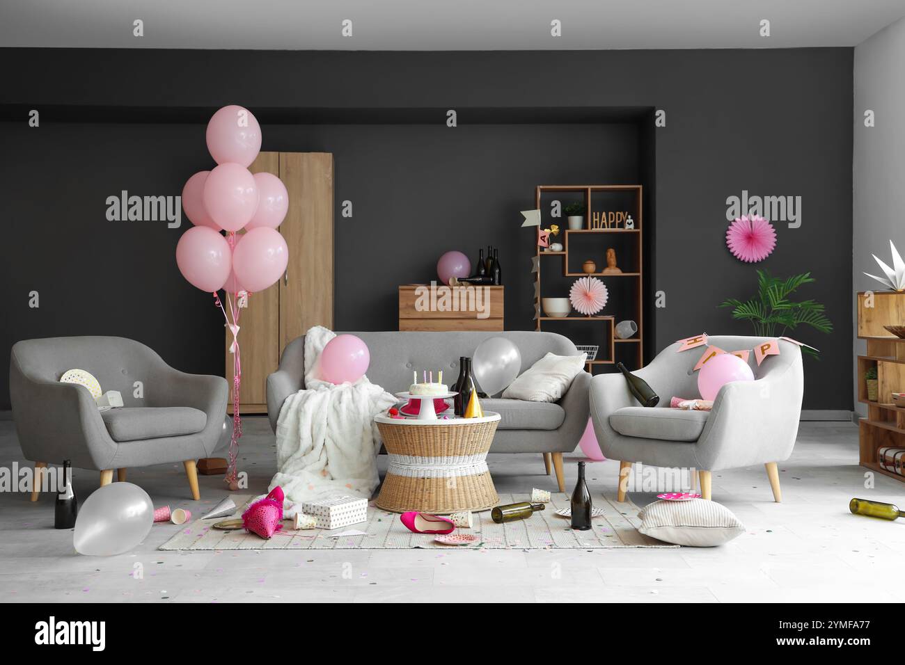 Interior of messy living room after Birthday celebration with sofa ...