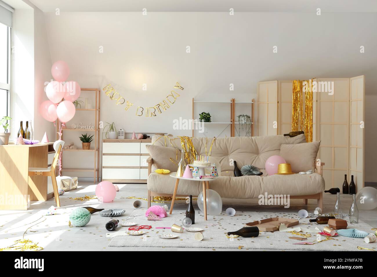 Interior of messy living room after Birthday celebration with sofa ...