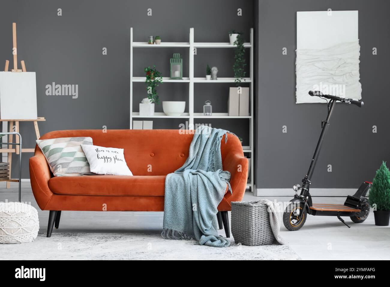 Interior of modern living room with electric scooter and sofa Stock ...