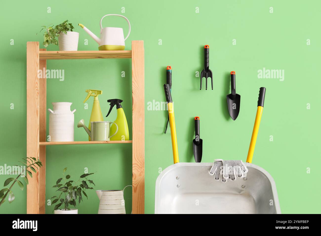 Interior of workshop with gardening tools and shelf unit Stock Photo ...