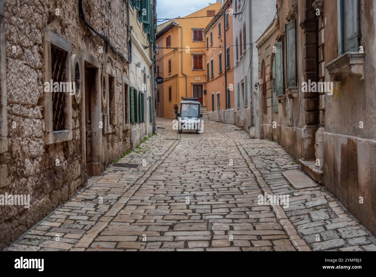 Old historical dreamy streets. Beautiful houses and businesses in a ...