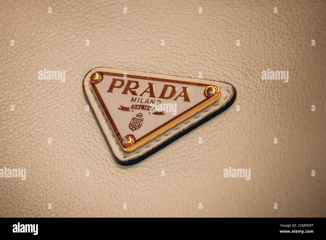 Milan, Italy - August 20, 2024: Prada enameled metal triangle logo ...