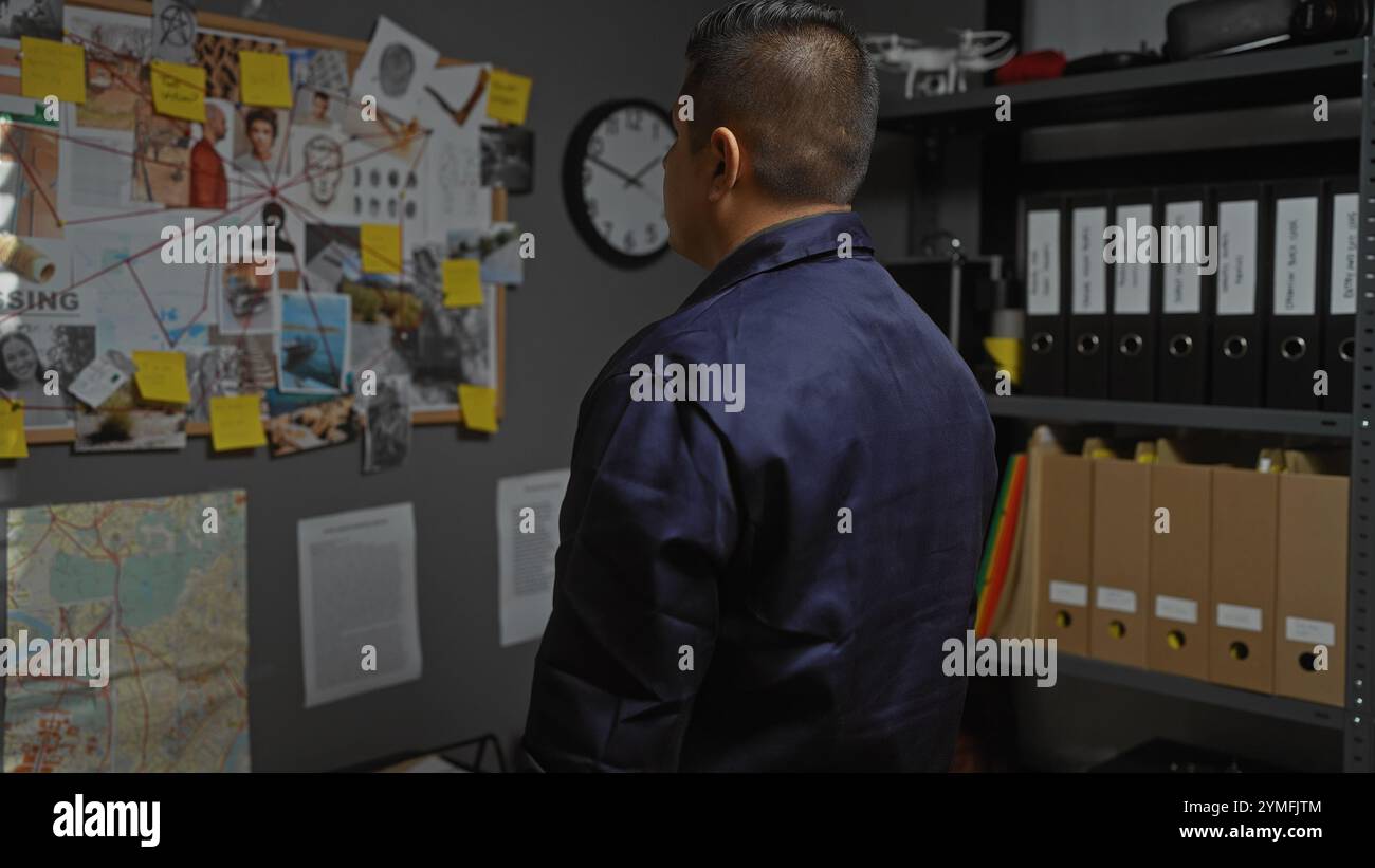 Hispanic man in detective office with evidence board, clock, files ...