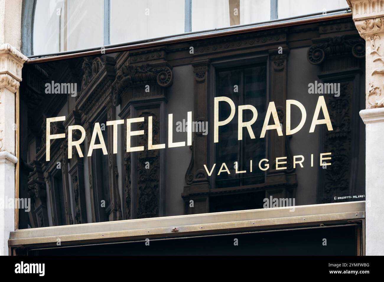 Milan, Italy - August 20, 2024: The facade of the first Prada store with the historic sign ...