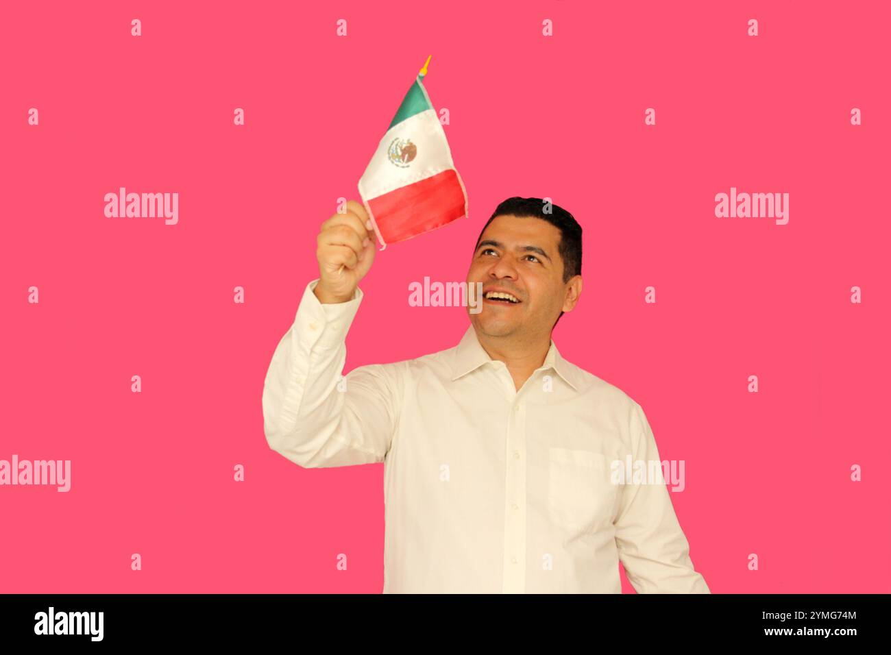 40 year old dark Mexican man shows the flag of Mexico with pride to ...