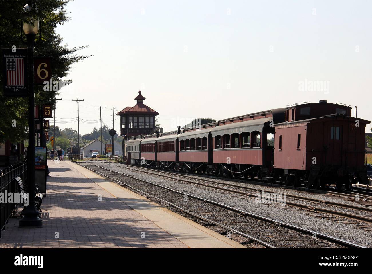Passenger platform, tracks and old-fashioned excursion train of ...
