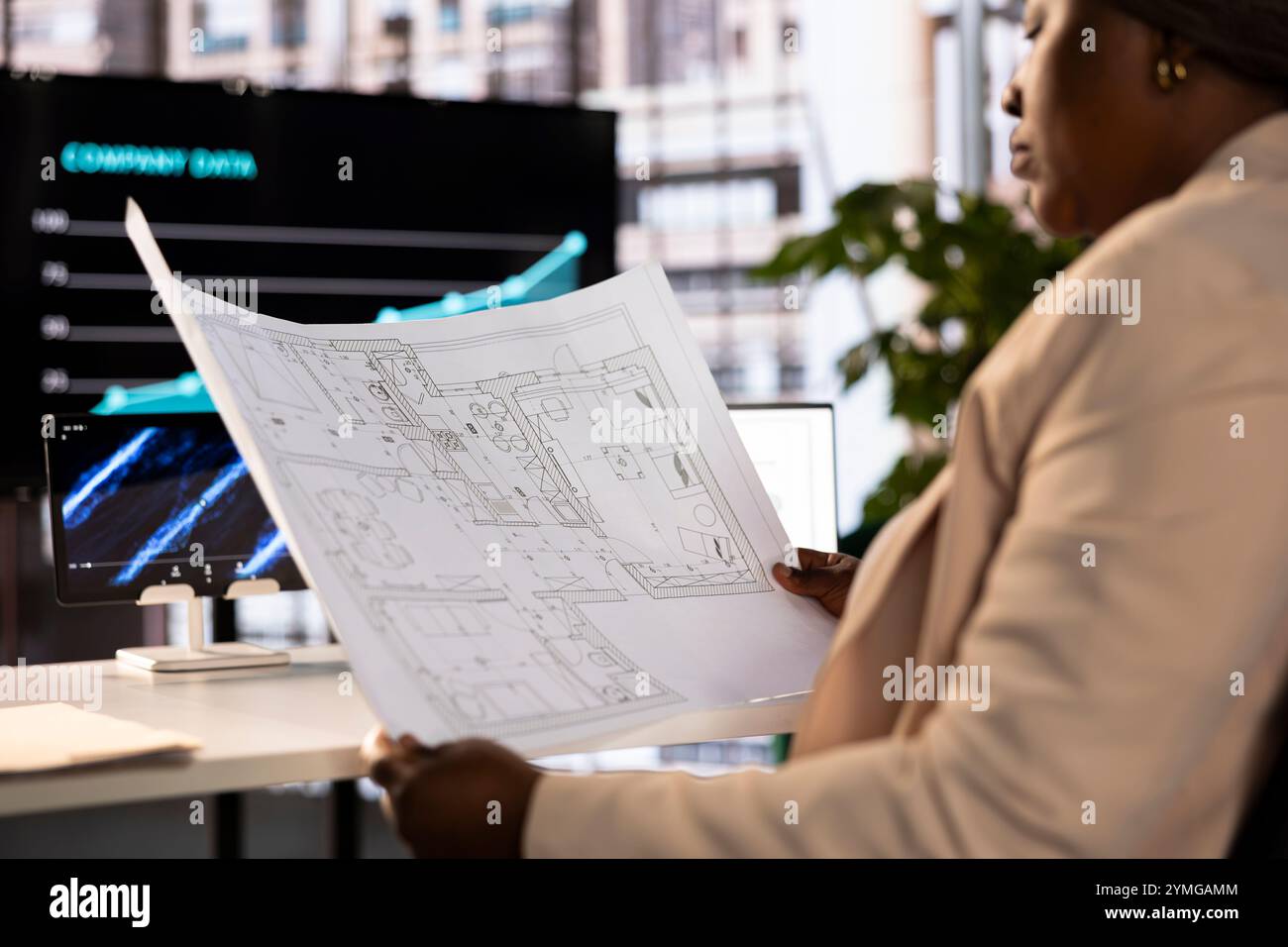 Architect developing architectural plans for residential, commercial, and industrial projects ...