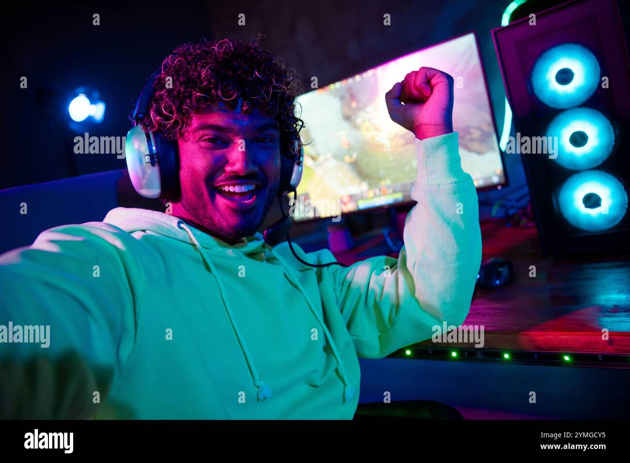Photo of gamer nice young male take selfie photo winning play computer ...