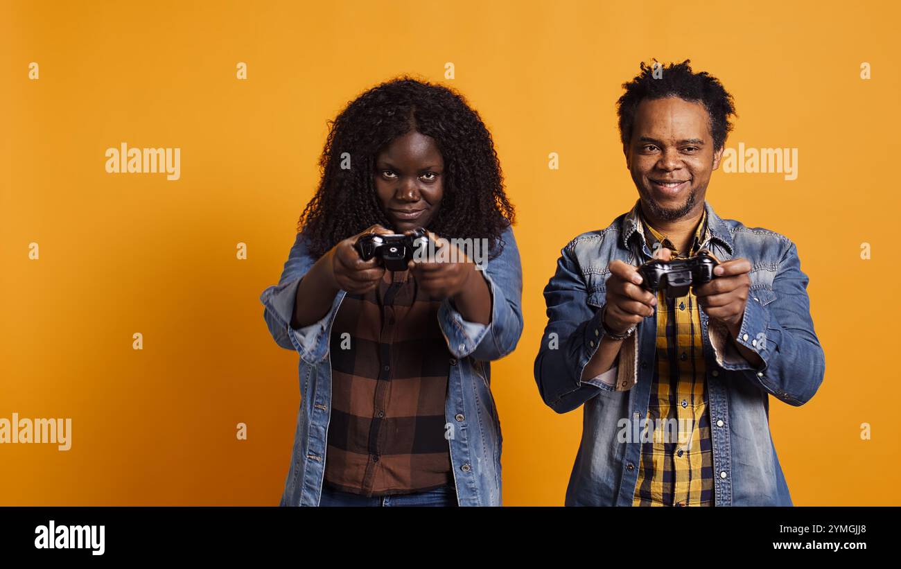 Cute couple gaming together getting hi-res stock photography and images ...