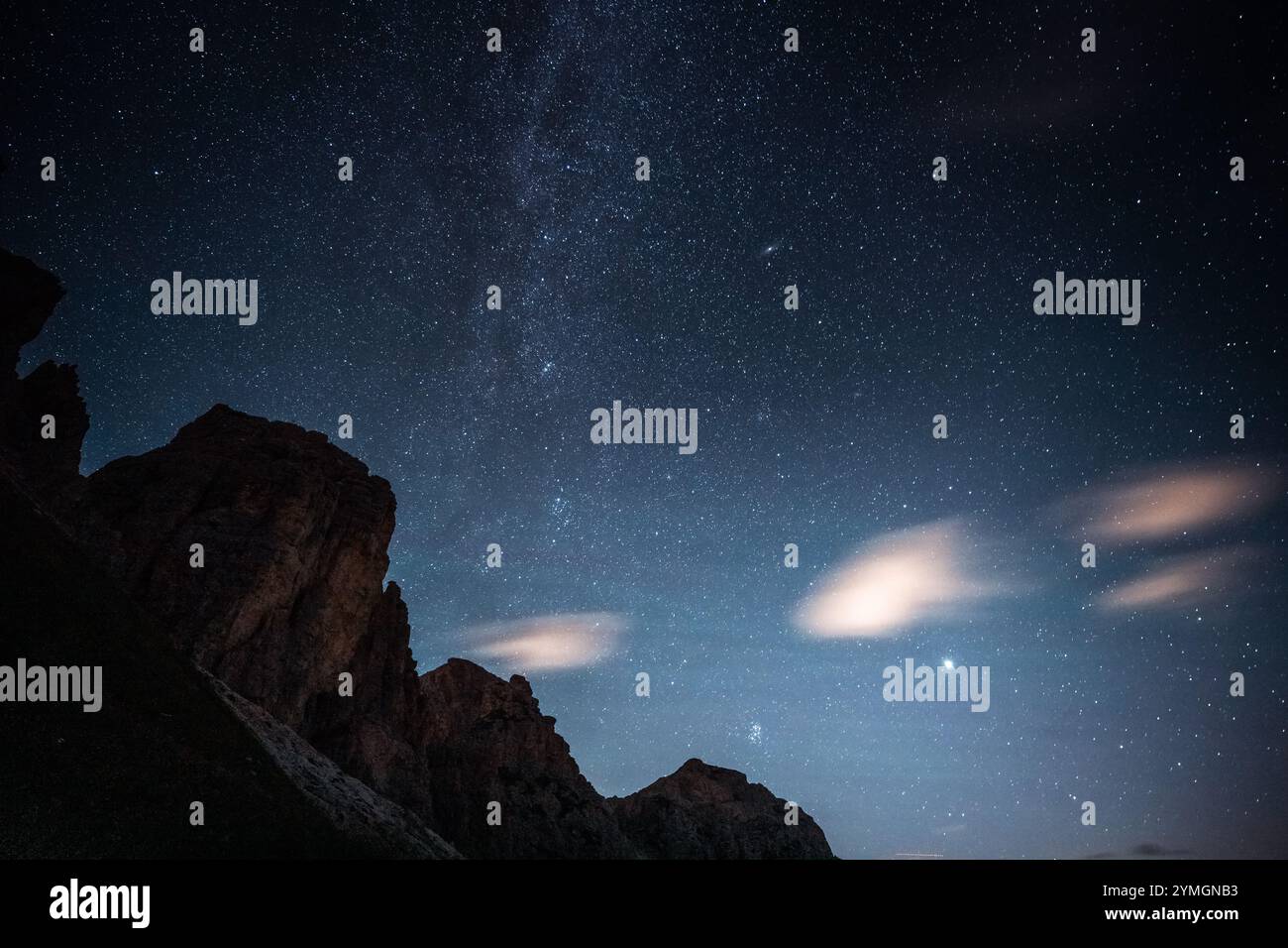 A beautiful starry night sky that displays countless stars, along with ...