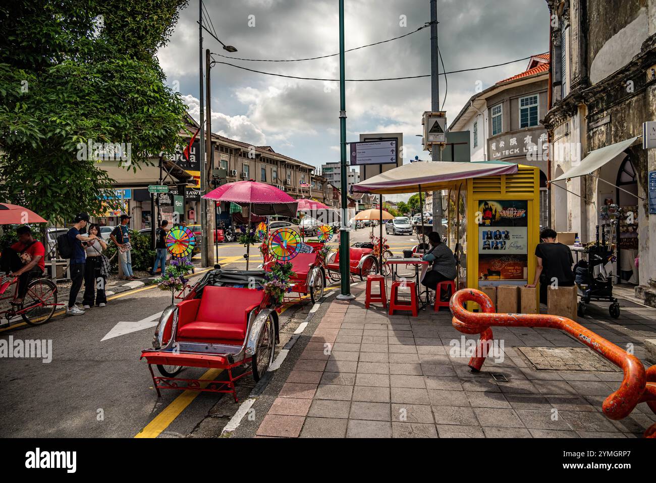 George Town, Penang, Malaysia: Colourful trishaws on Armenian St in ...