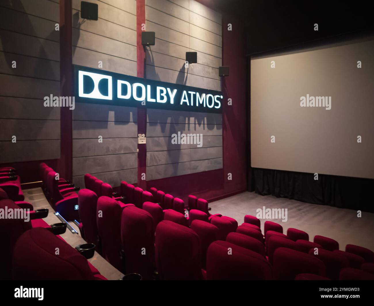 Empty Movie Theater With Dolby Atmos Sound System Display next to ...