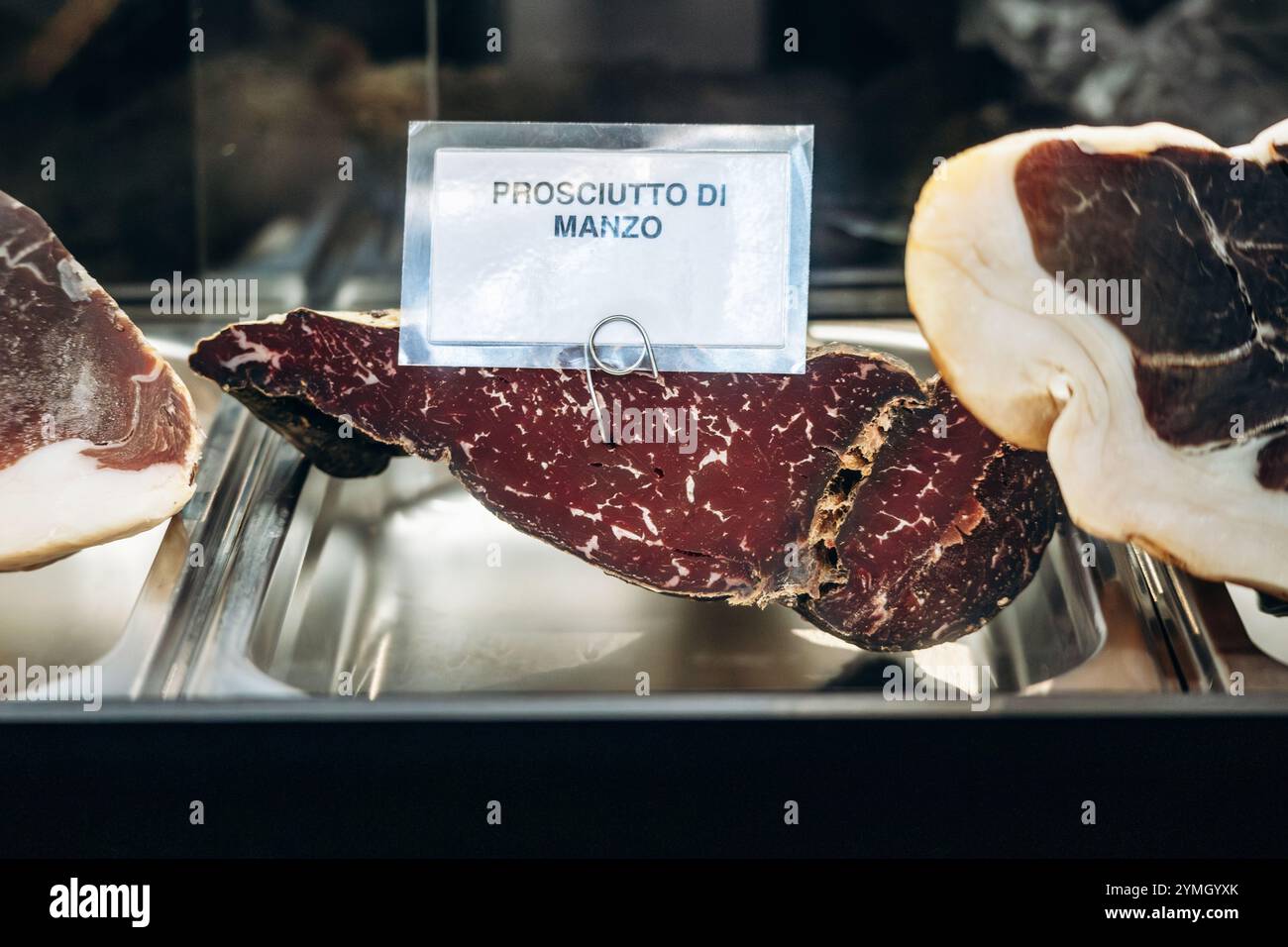 Prosciutto di manzo (translation - beef ham) in a display case at a ...