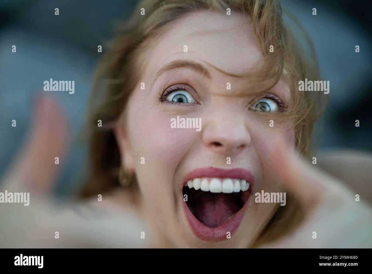 Closeup portrait of Young Excited Woman show thumb up. Excited people ...