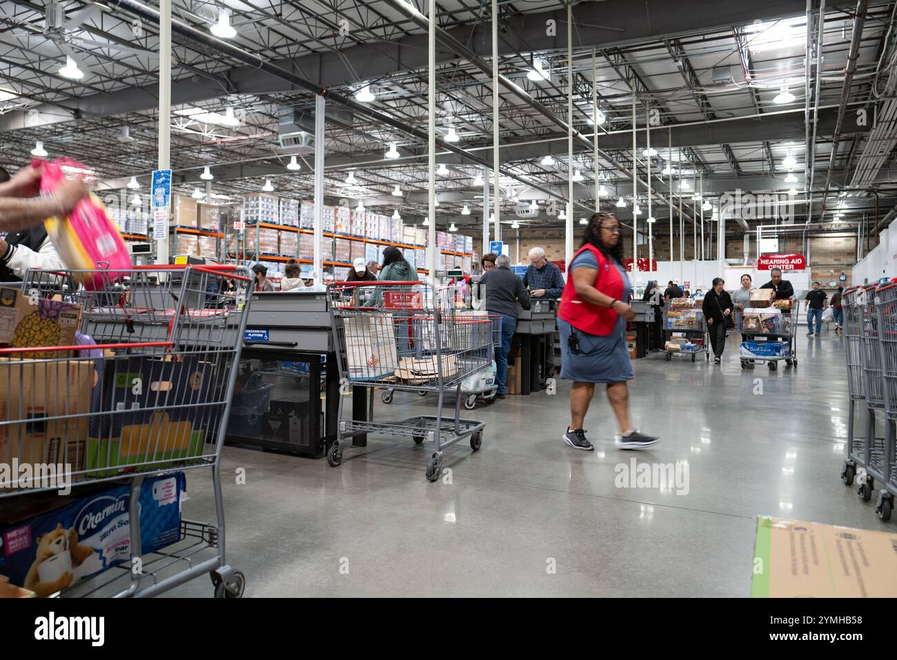 Images of a bustling Costco store featuring the exterior, entrance, and ...