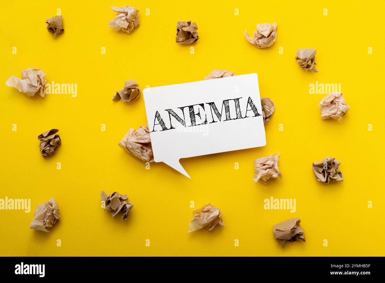 Yellow background with a white word that says Anemia written on it. The ...