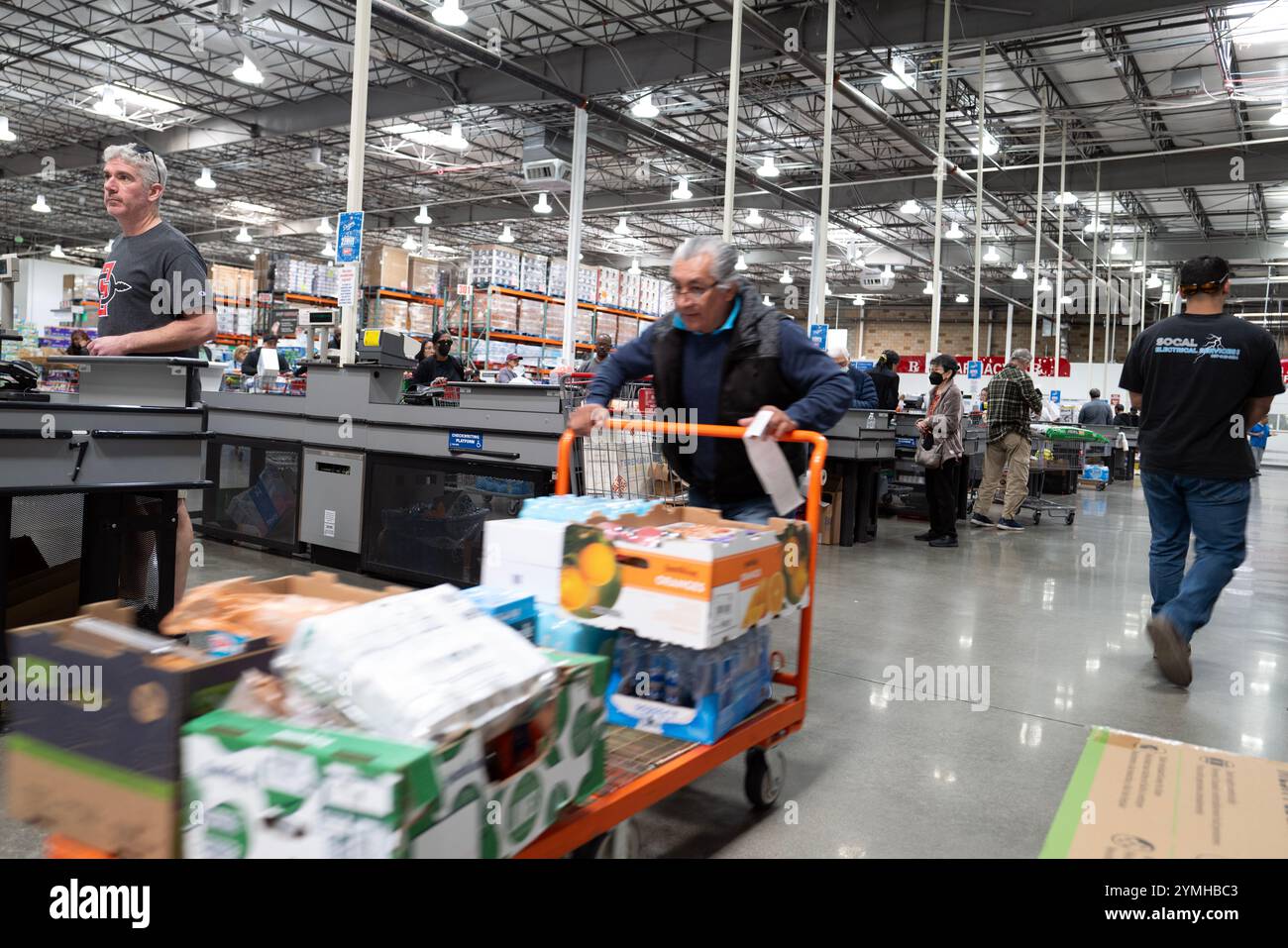 Images of a bustling Costco store featuring the exterior, entrance, and ...