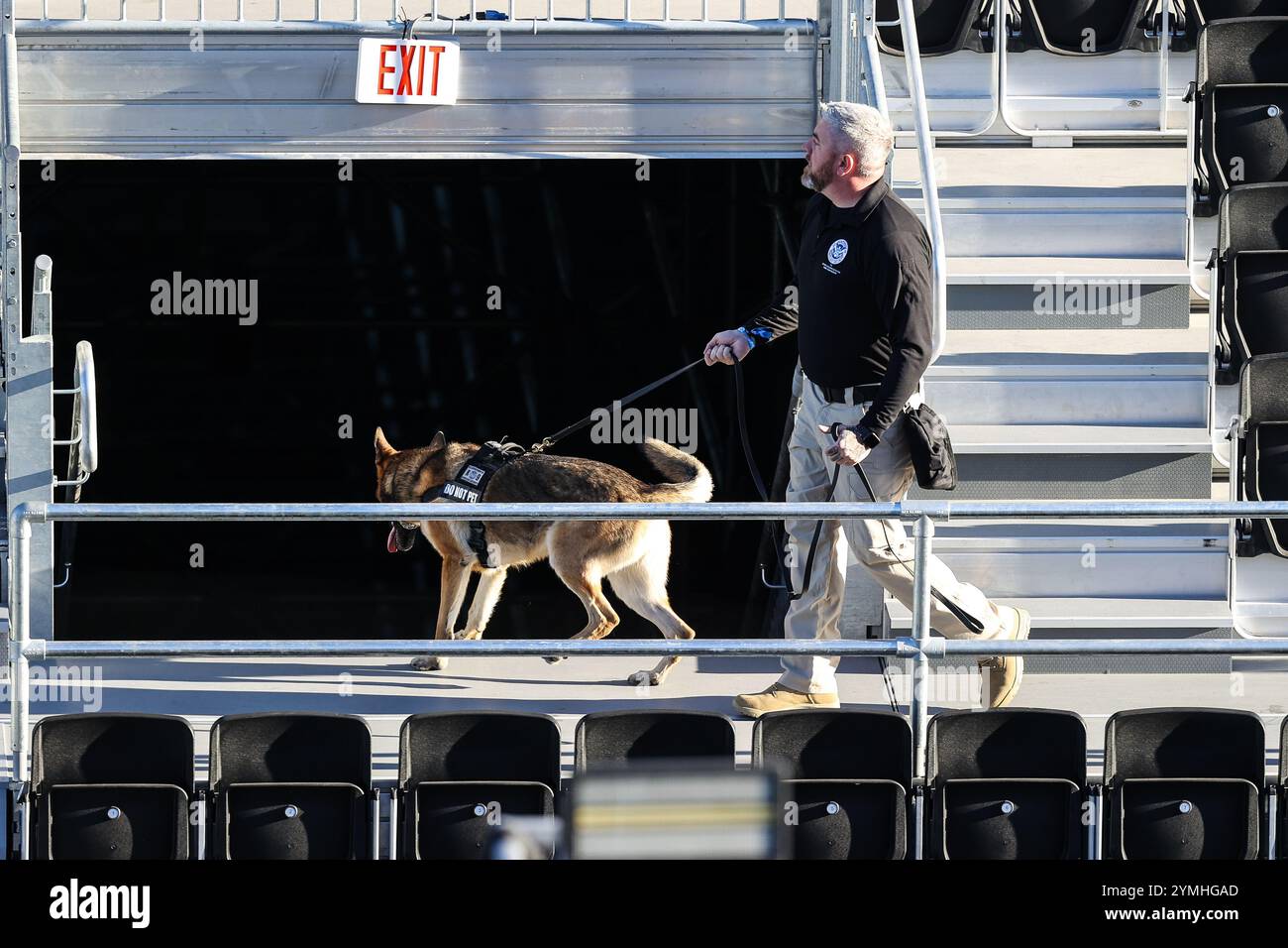 November 21, 2024: Security checks the grandstands with a K9 prior to ...