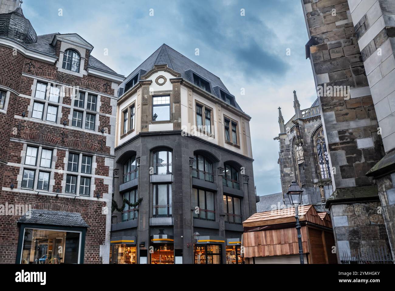 A cobblestone street in the medieval city center of Aachen, Germany ...