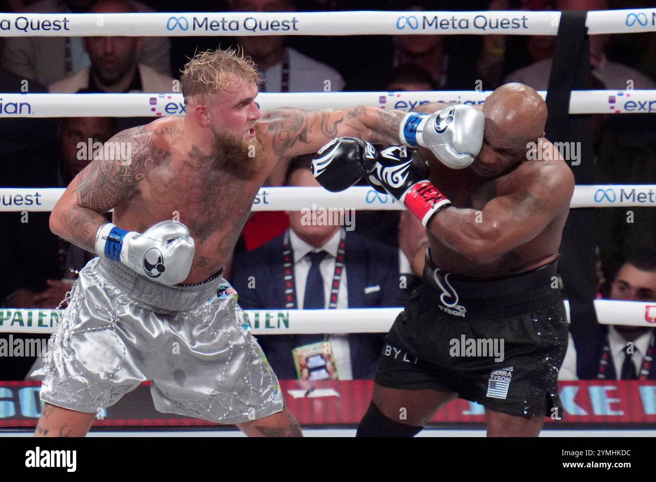 Jake Paul lands a left to Mike Tyson during their heavyweight boxing ...