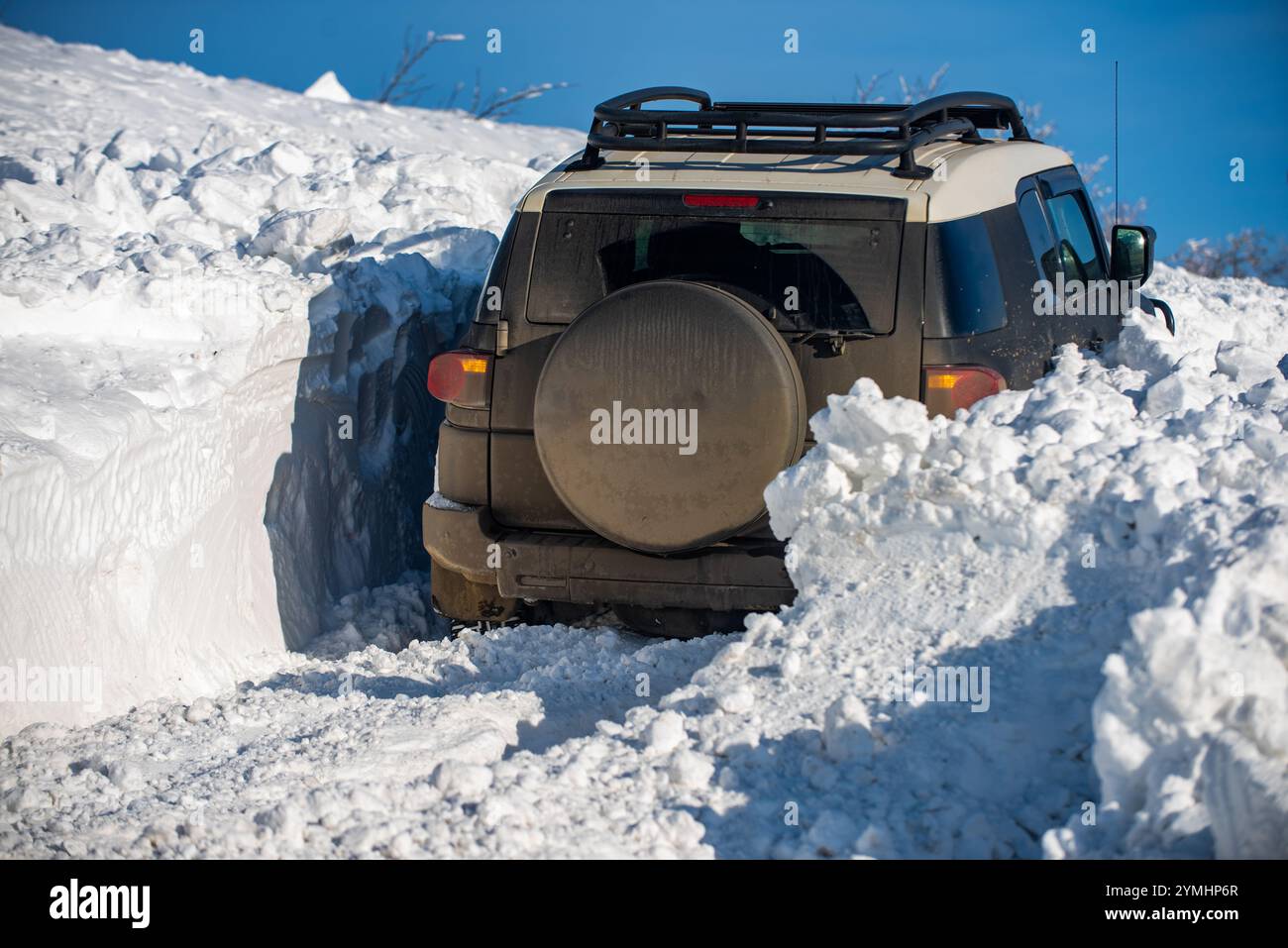 Winter tires. Off road in snow on the mountains. Offroad vehicle in ...