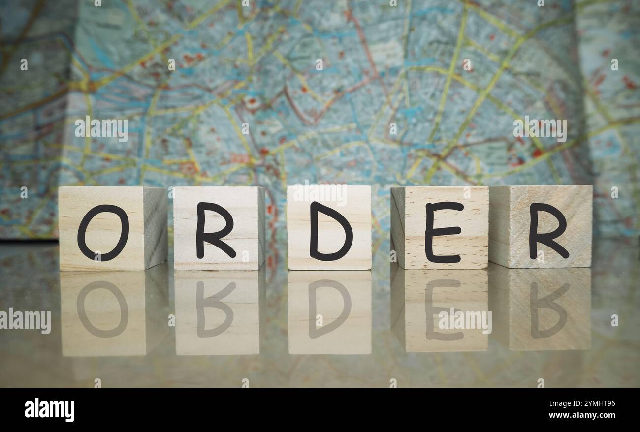 Wooden block with the word order written on it. The blocks are arranged ...