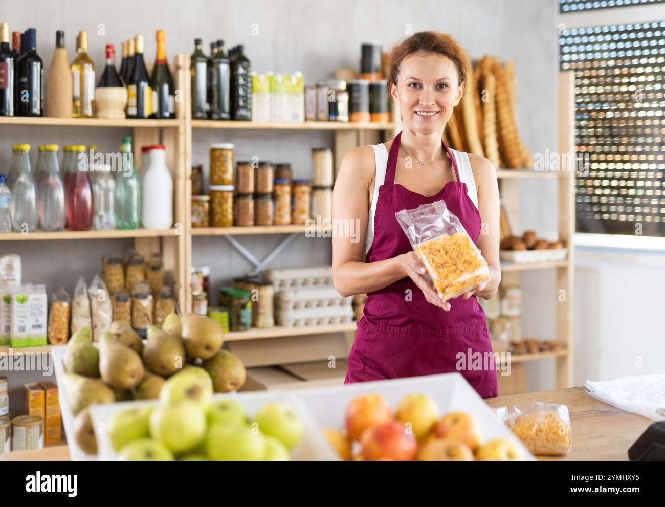 Female vendor behind counter portrait hi-res stock photography and ...