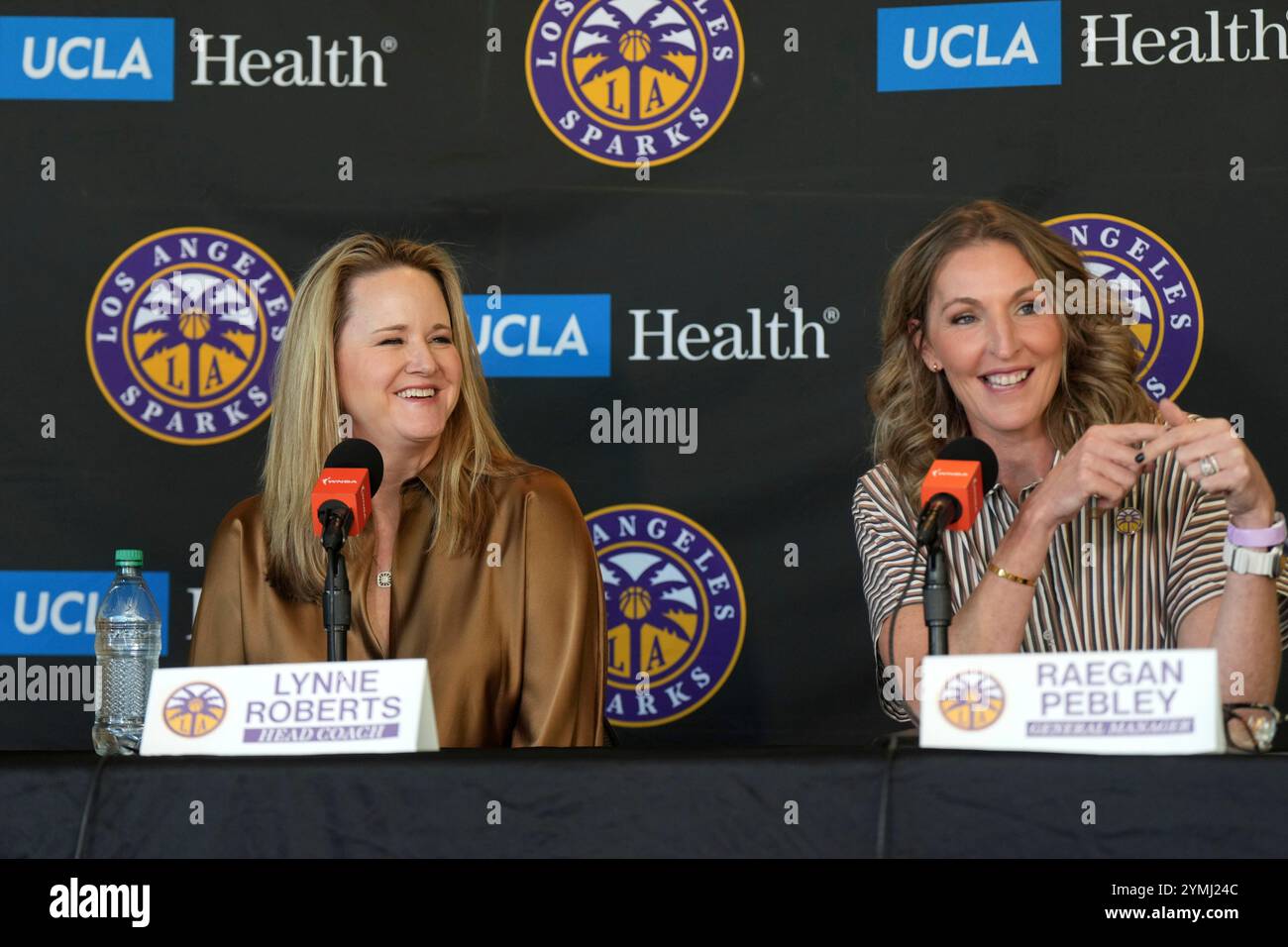 Lynne Roberts (left) is introduced as the LA Sparks basketball coach by ...