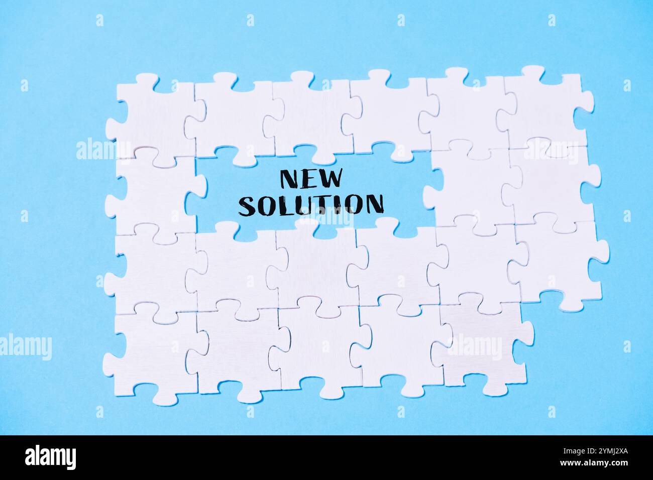 Puzzle with the word new solution written in the middle. The puzzle ...
