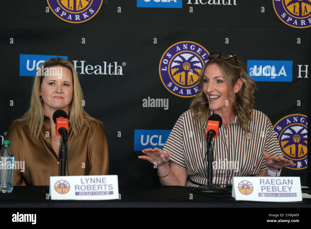 Lynne Roberts (left) is introduced as the LA Sparks basketball coach by ...