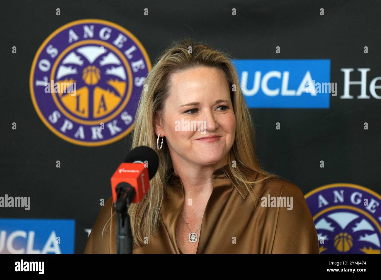 Lynne Roberts is introduced as the LA Sparks head basketball coach at a ...