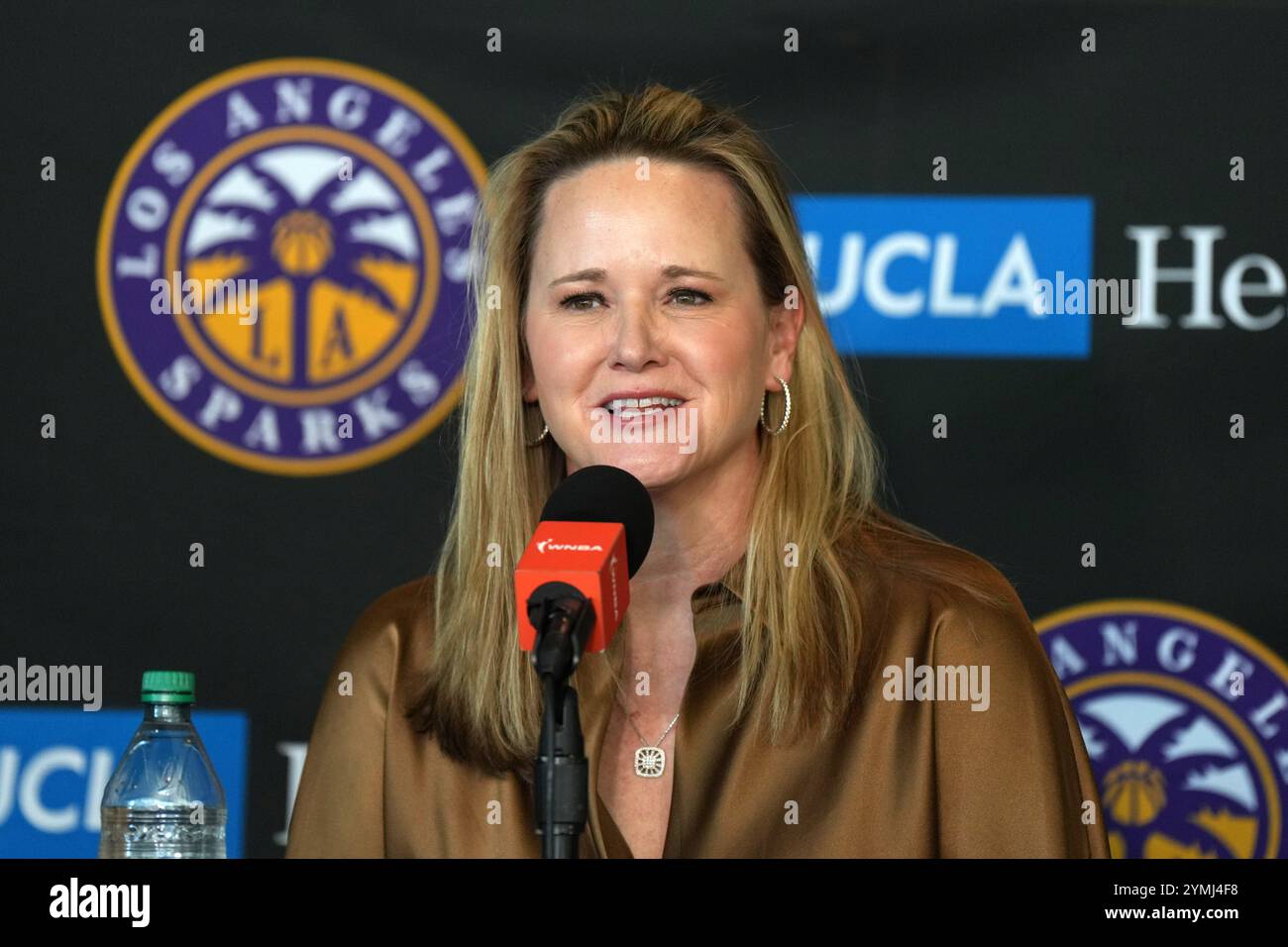Lynne Roberts is introduced as the LA Sparks head basketball coach at a ...