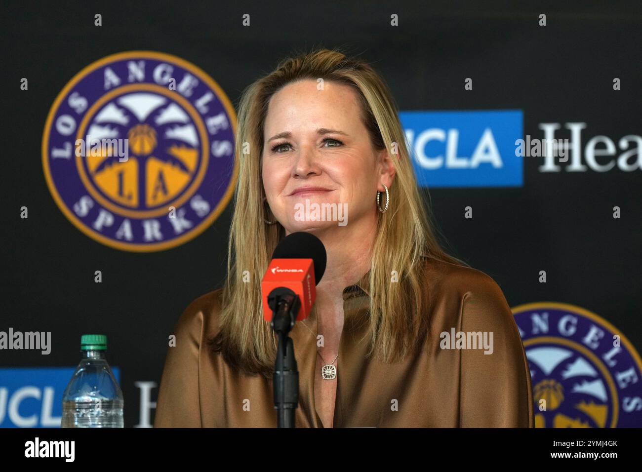 Lynne Roberts is introduced as the LA Sparks head basketball coach at a ...