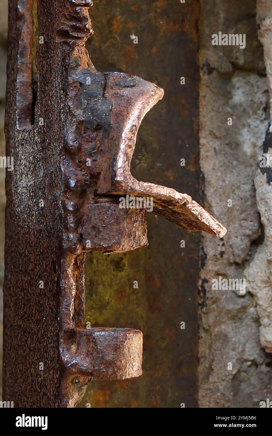 Wrought Iron Lock - Damaged, vandalised Stock Photo - Alamy