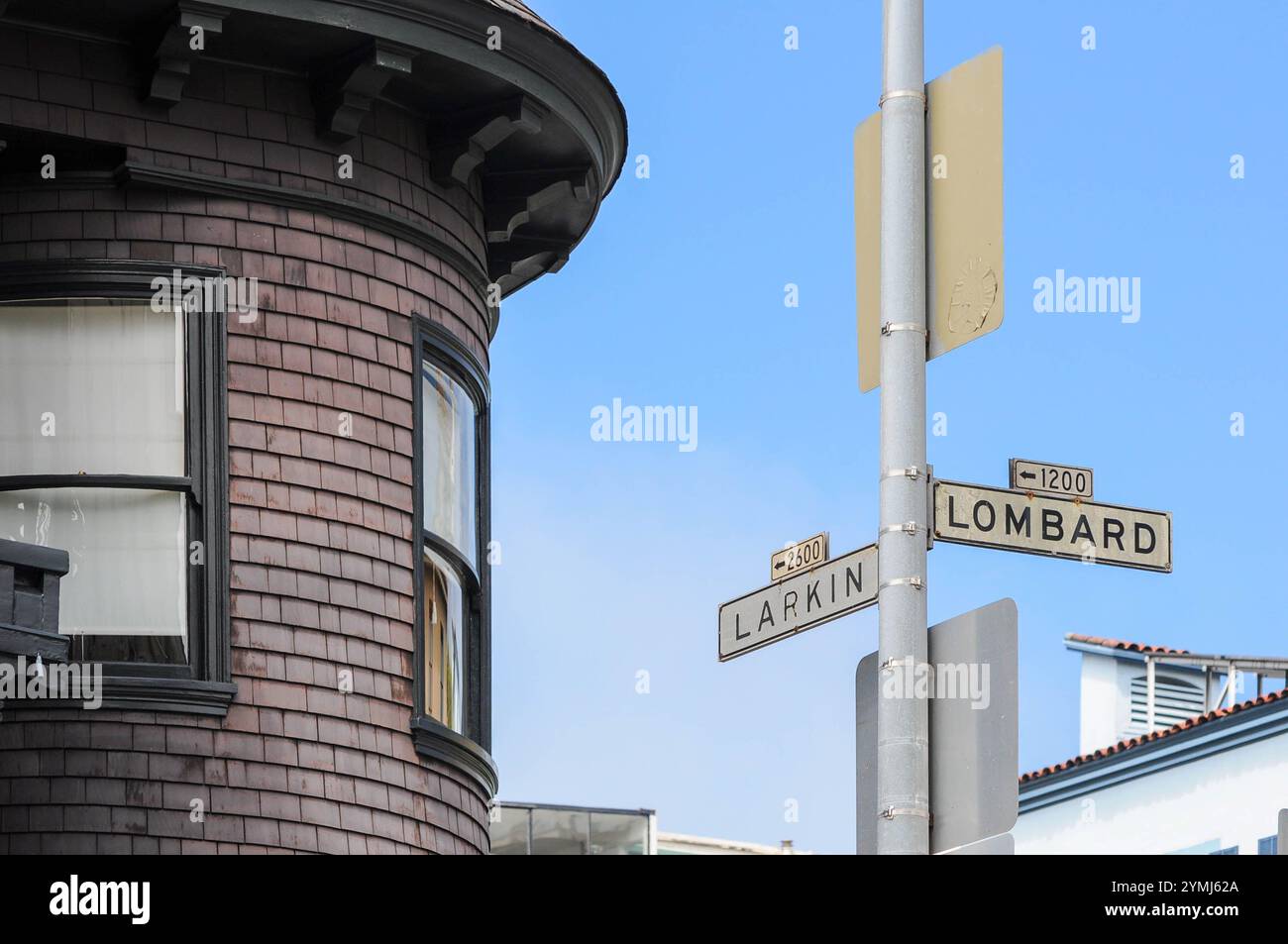 Iconic SF street signs at Larkin and Lombard with historic architecture ...